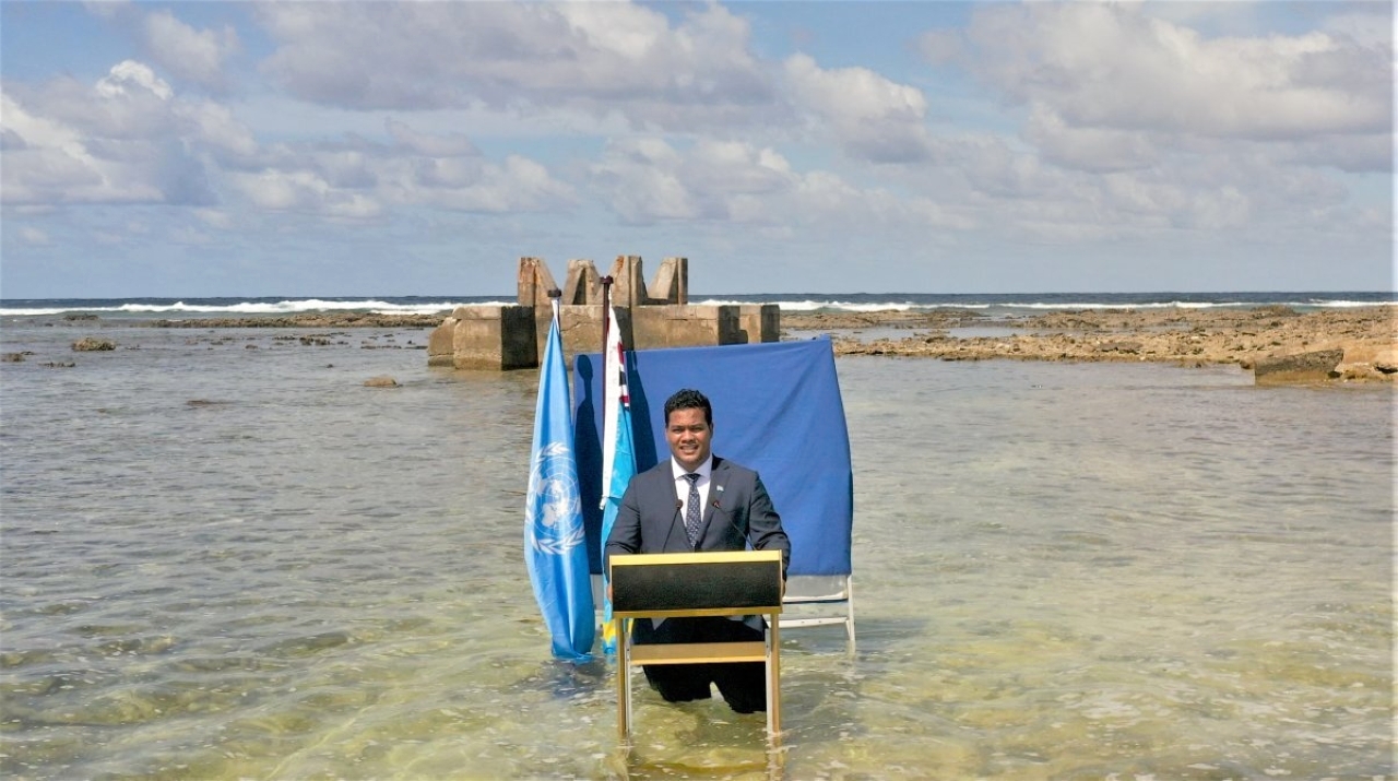 Digital version of a country disappearing in the Pacific Ocean ...